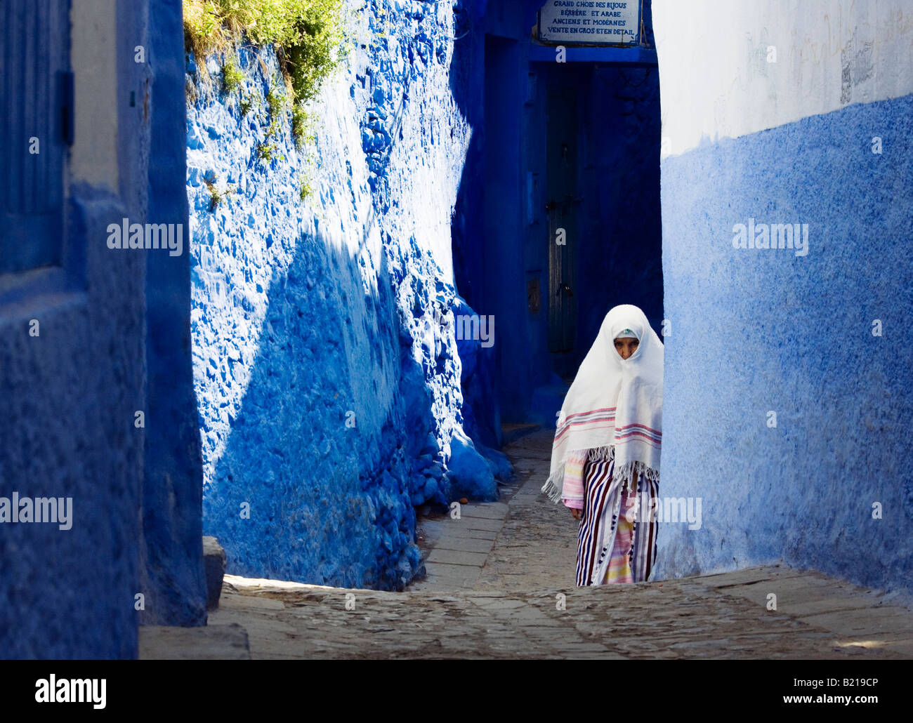 Chefchaouen woman in traditional dress of the mountain villages near ...