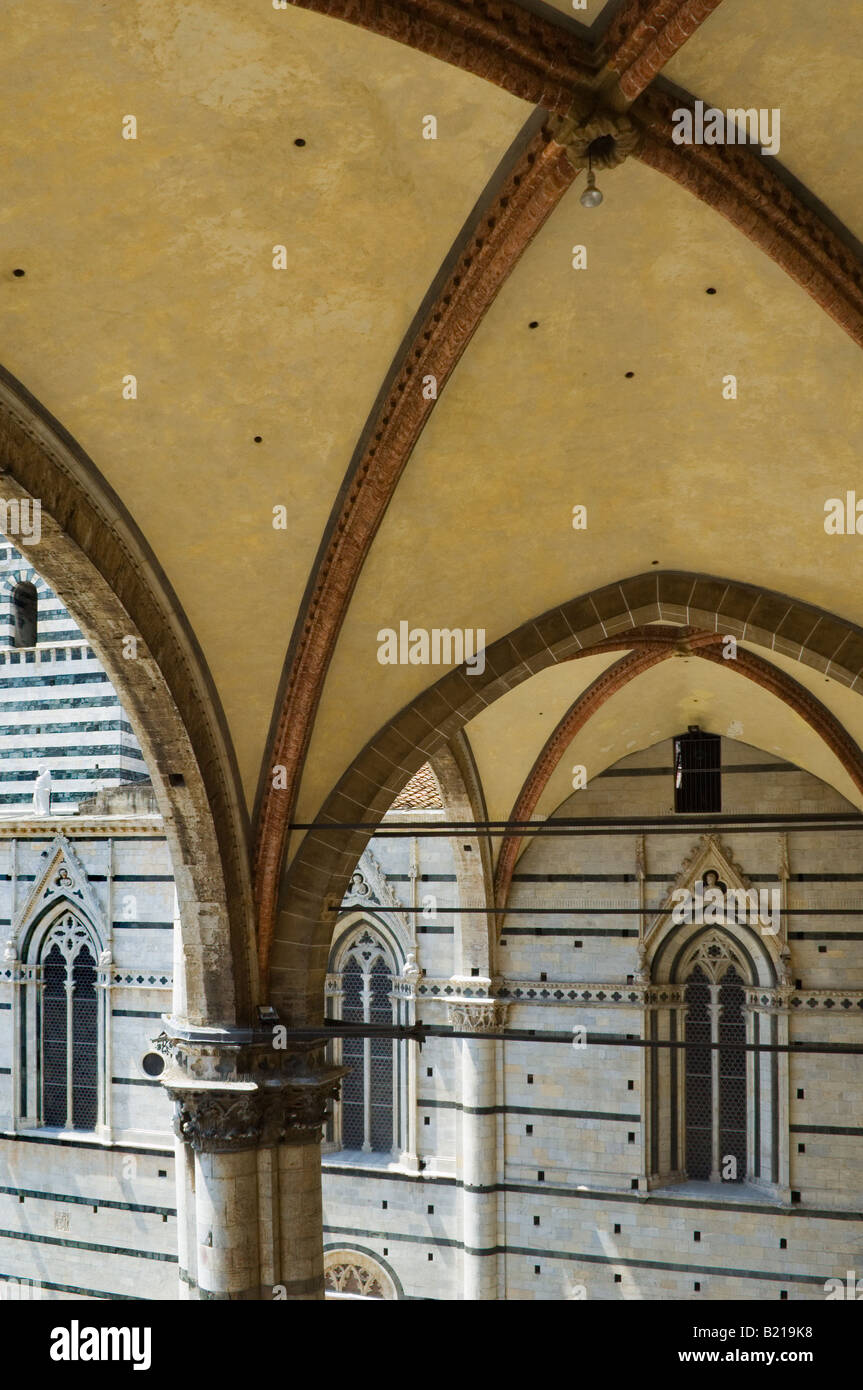 Looking through the cloisters of the Duomo, Siena, Italy Stock Photo ...