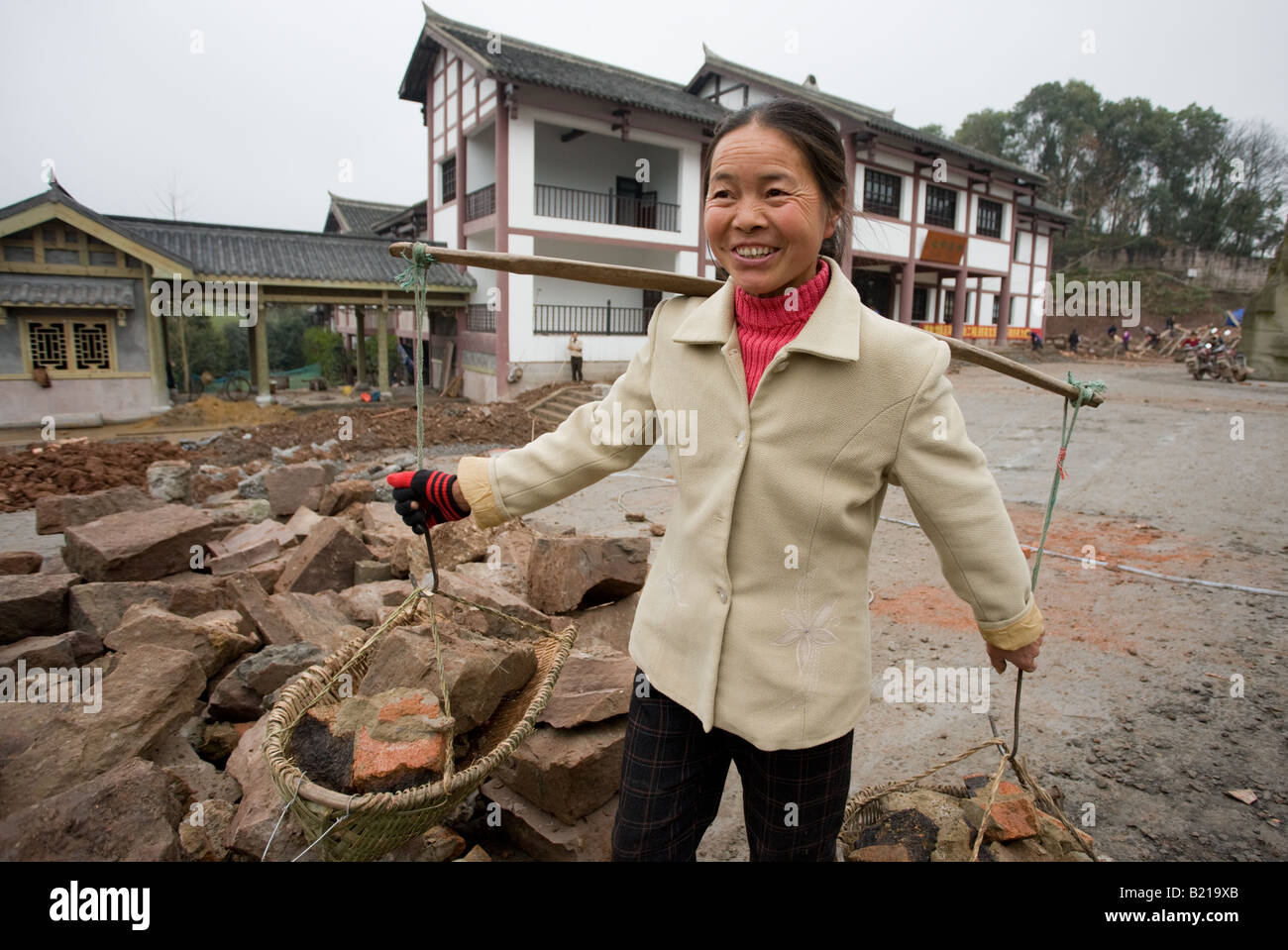 Woman at work building new tourist centre at Dazu Rock Carvings Mount ...