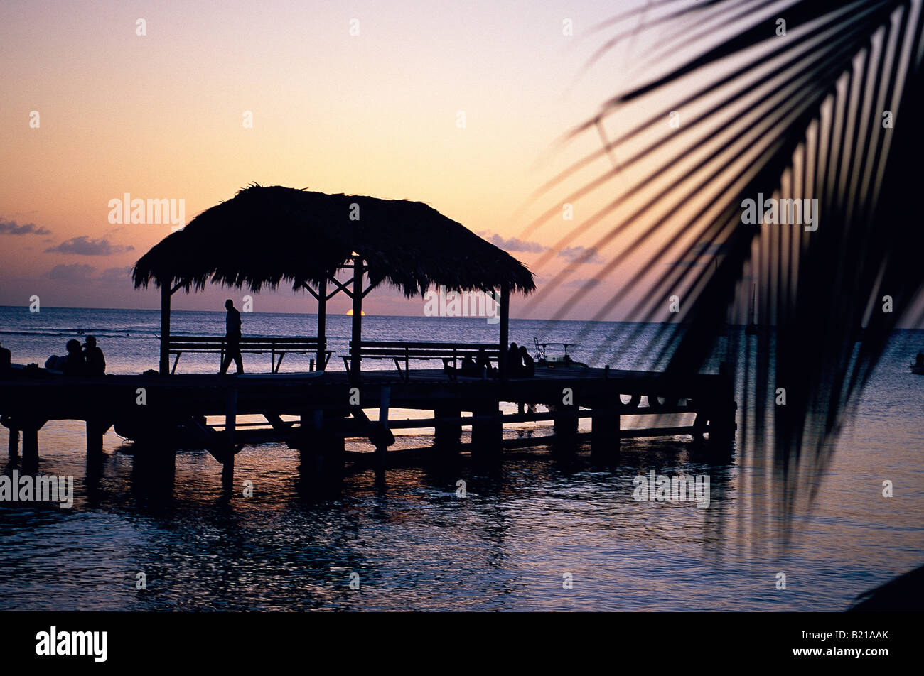 Jetty in sunset Pigeon Point Tobago Stock Photo - Alamy