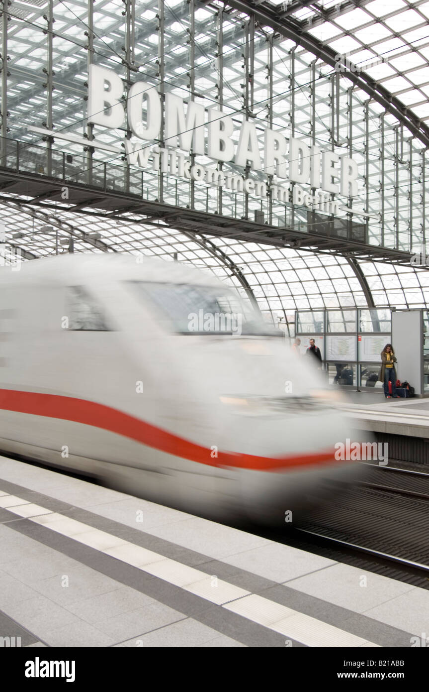 A blurred inter city express train pulling into Berlin Central station ...