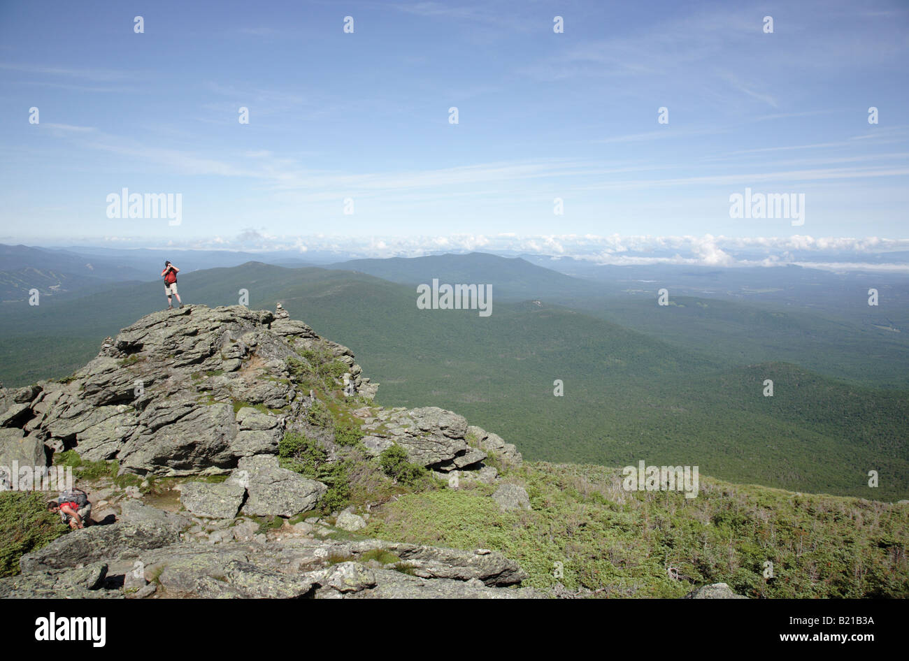 Hikers climb Caps Ridge Trail during the summer months Located in the ...