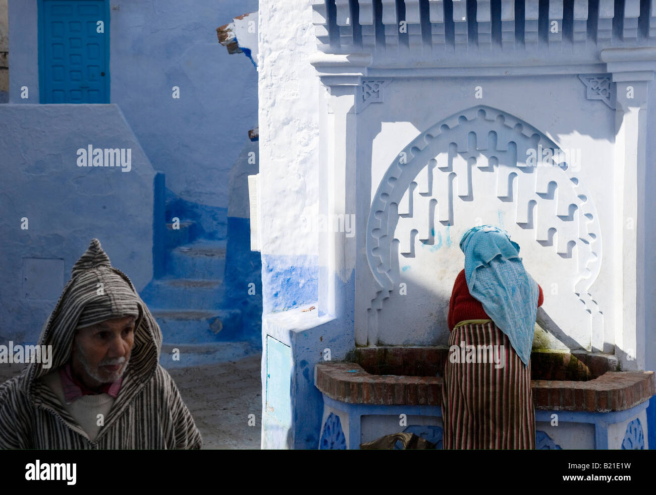 Chefchaouen woman in traditional dress of the mountain villages near ...