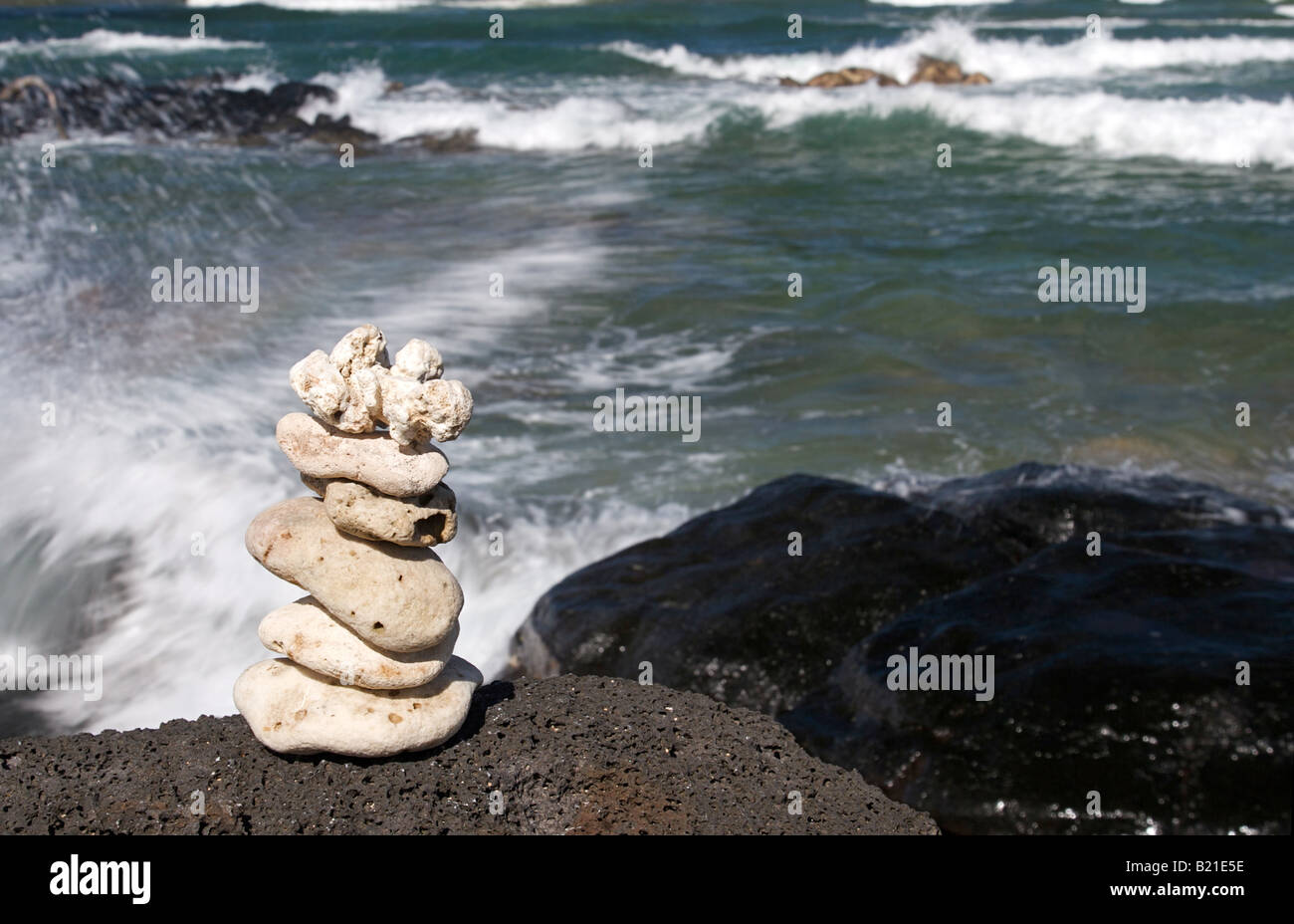 White coral rocks stacked by a meditating zen follower Stock Photo - Alamy
