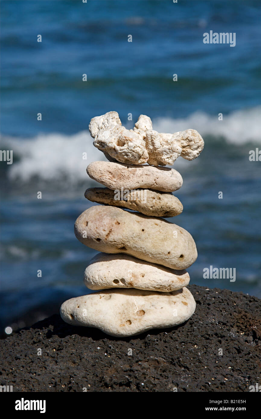 White coral rocks stacked by a meditating zen follower Stock Photo - Alamy