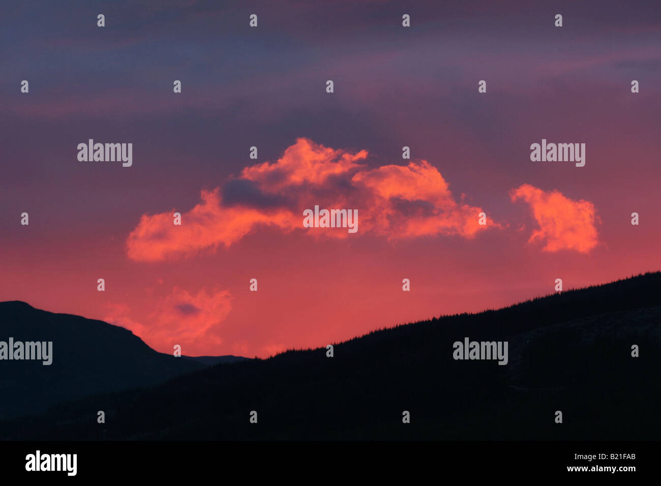 Sunset sky over mountains hi-res stock photography and images - Alamy