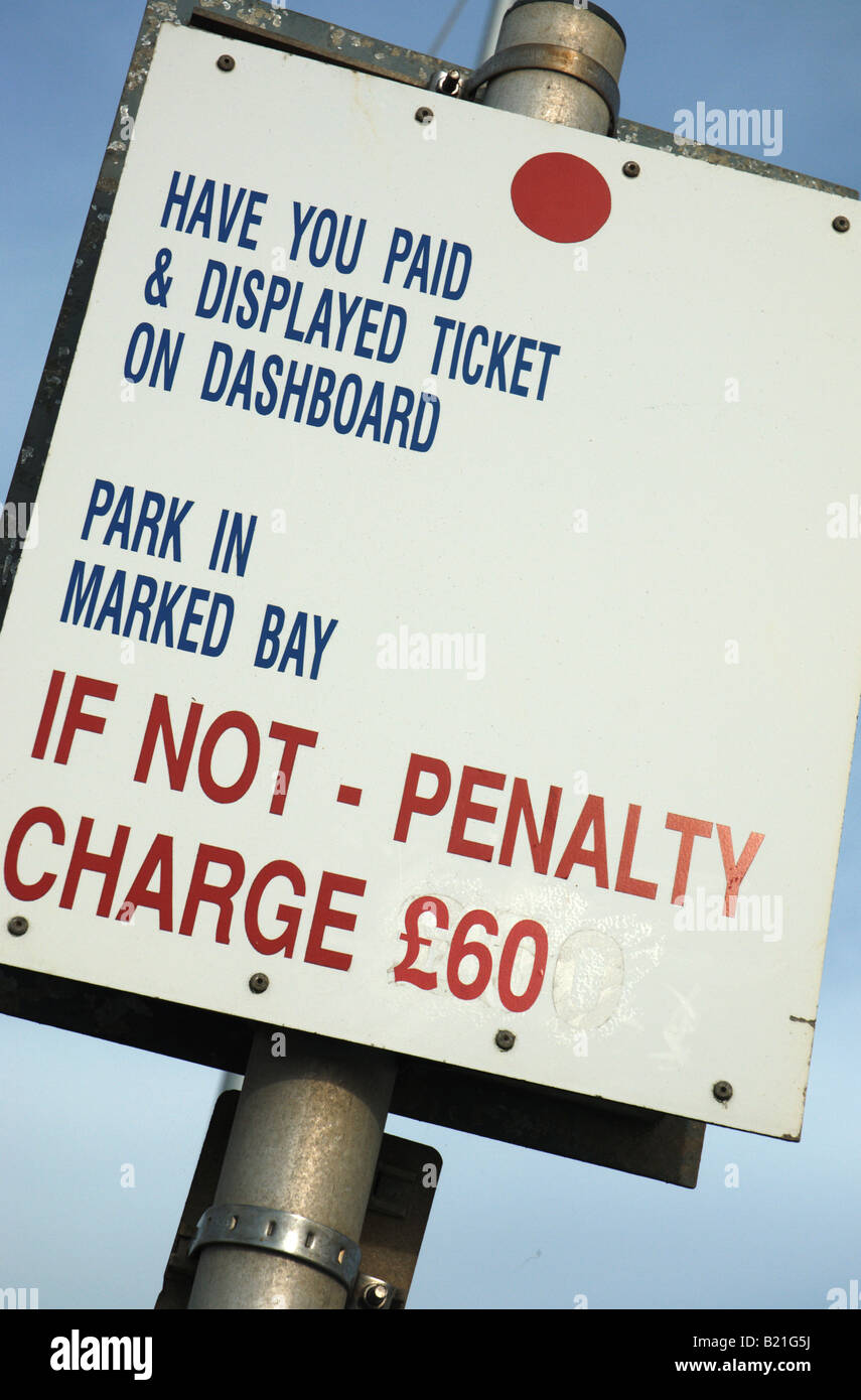Parking penalty sign in a car park Stock Photo - Alamy