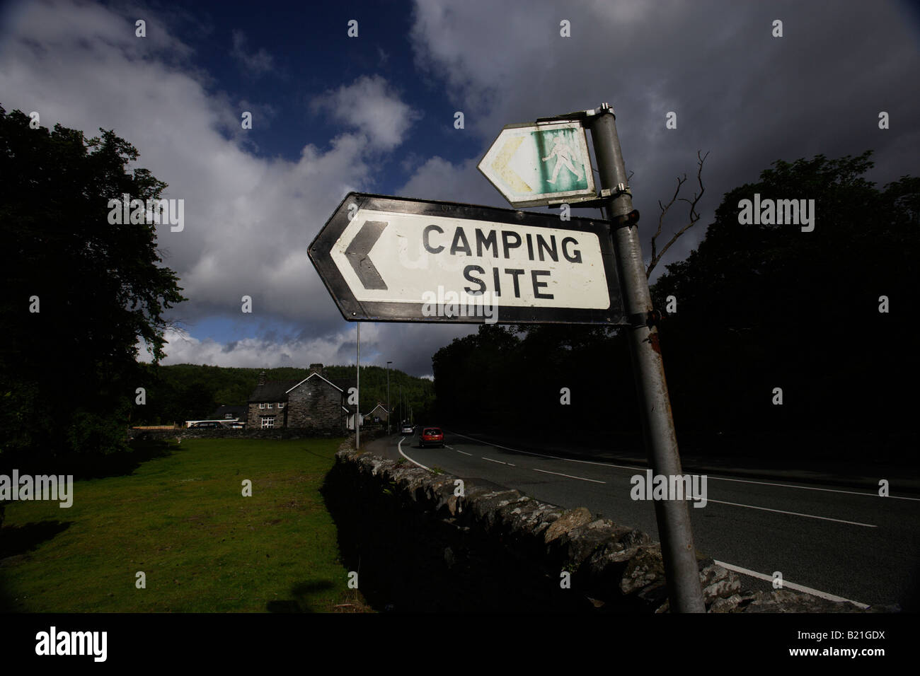Camping site sign with dark sky Stock Photo - Alamy
