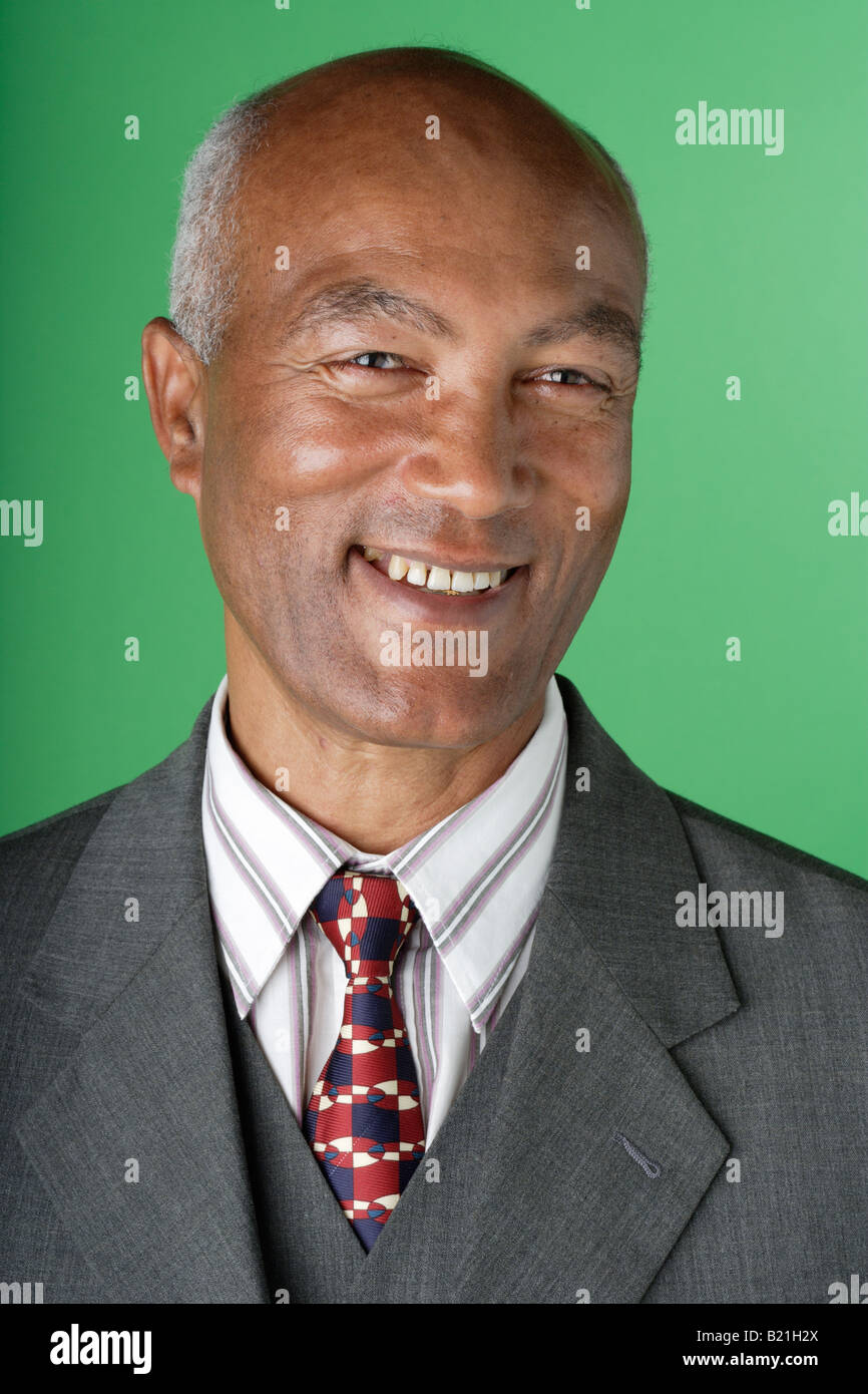 Smiling man in a suit Stock Photo - Alamy