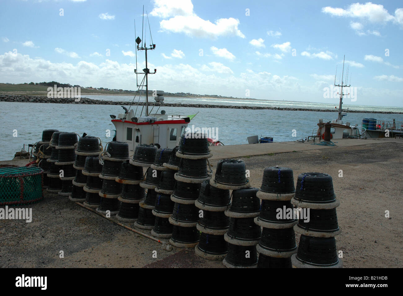 Row of lobster pots hi-res stock photography and images - Alamy