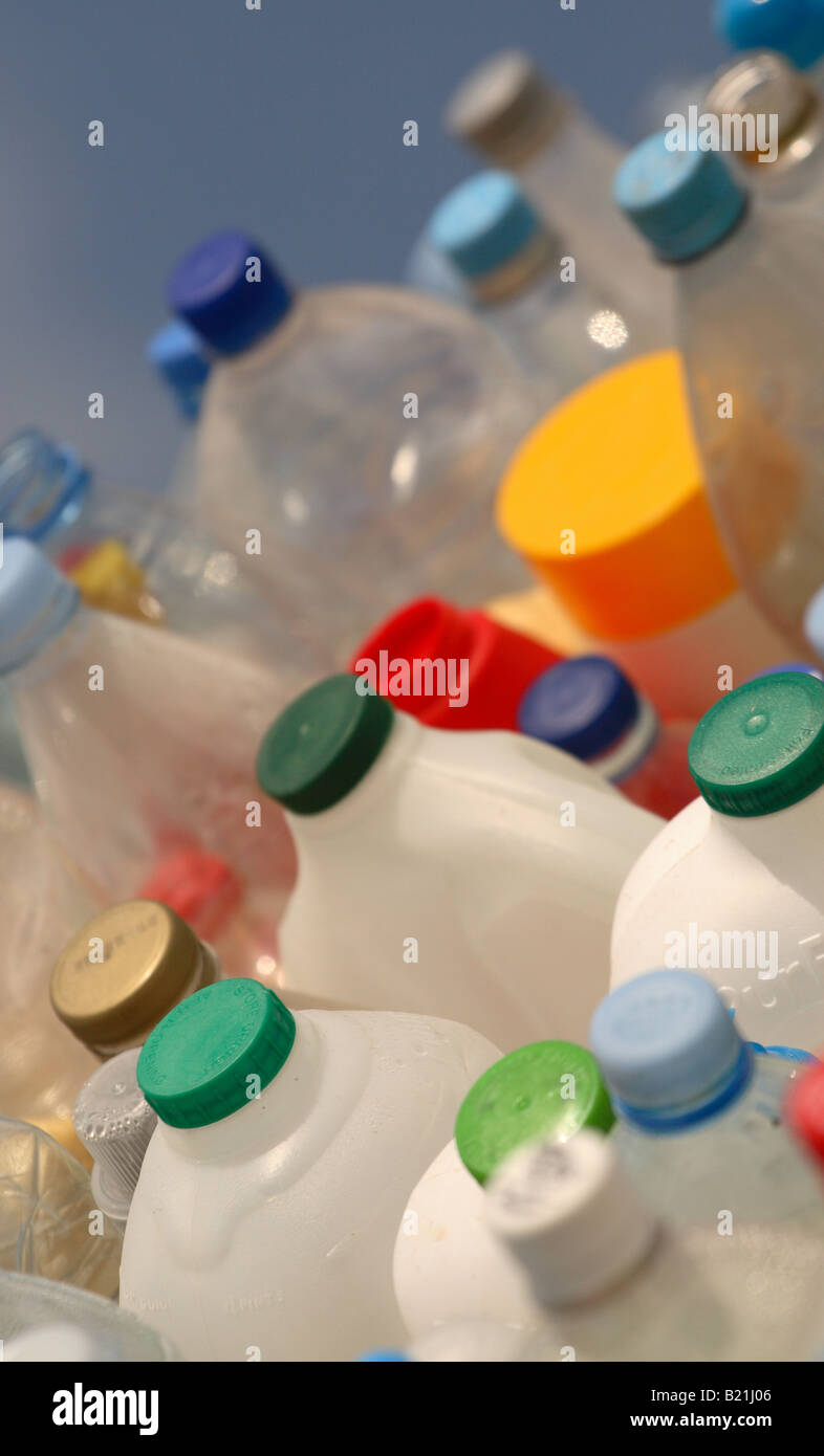 Pile stack of assorted plastic bottles with colourful lids Stock Photo ...