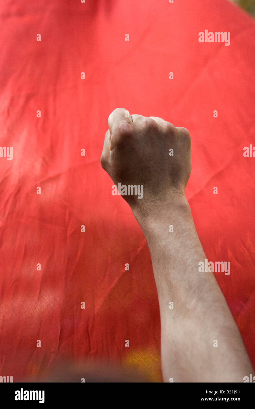 Marxism fist hi-res stock photography and images - Alamy