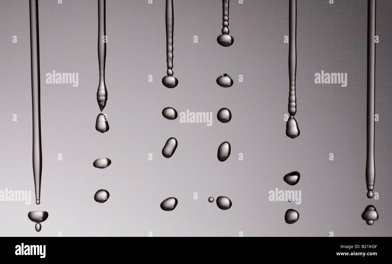 falling jets of water split up in drops Stock Photo - Alamy