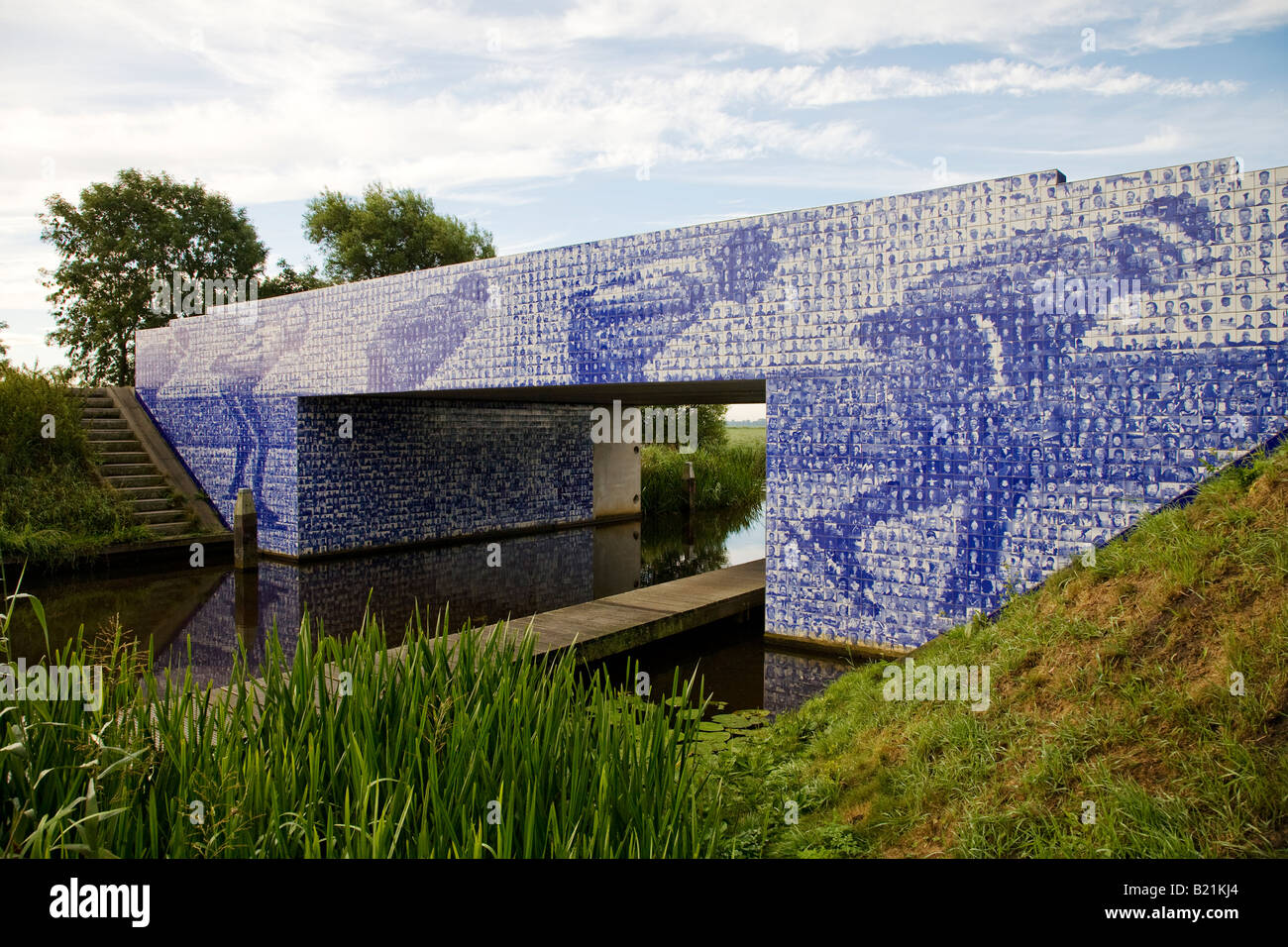 bridge with portraits of skaters on tiles. Together they form the ...