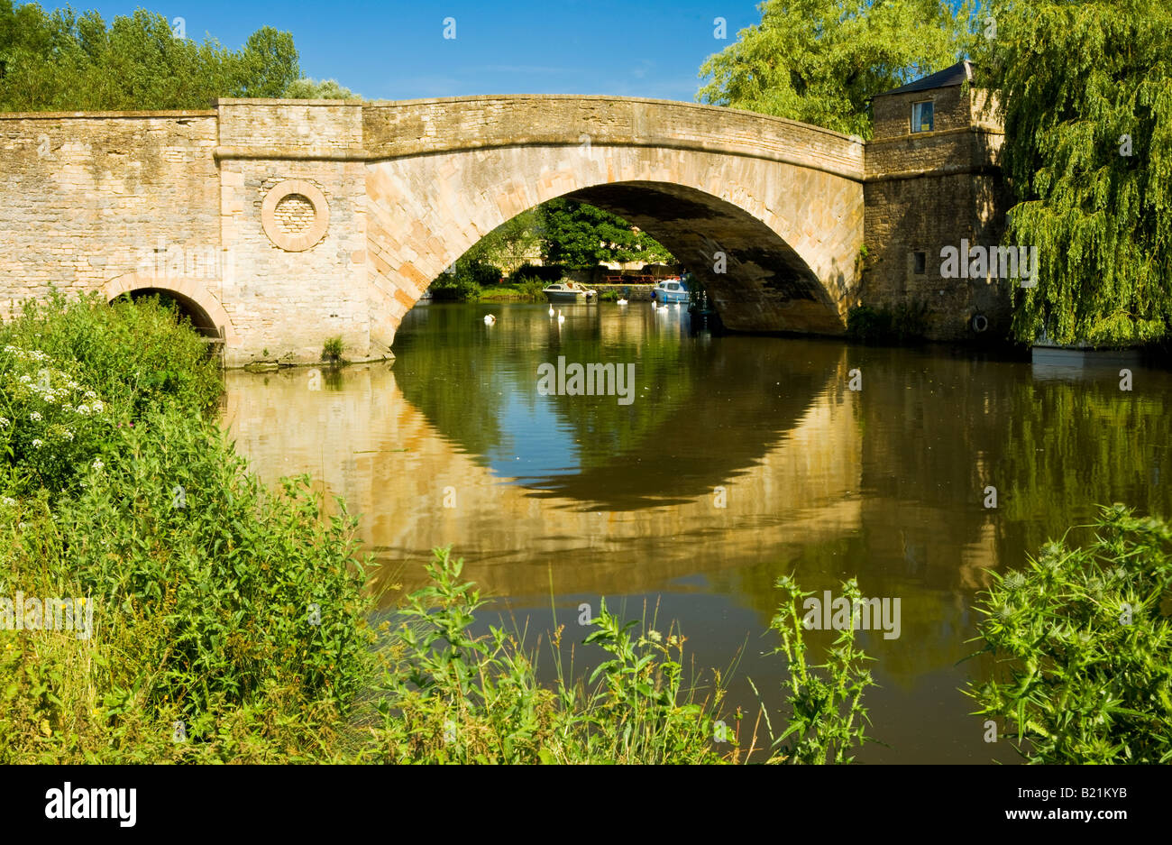 Halfpenny Bridge, an old toll bridge of Cotswold stone over the River ...