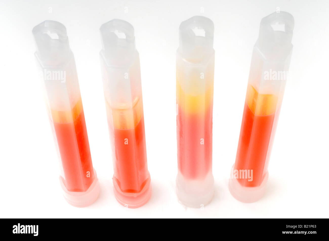 Four red safety lightsticks Stock Photo - Alamy
