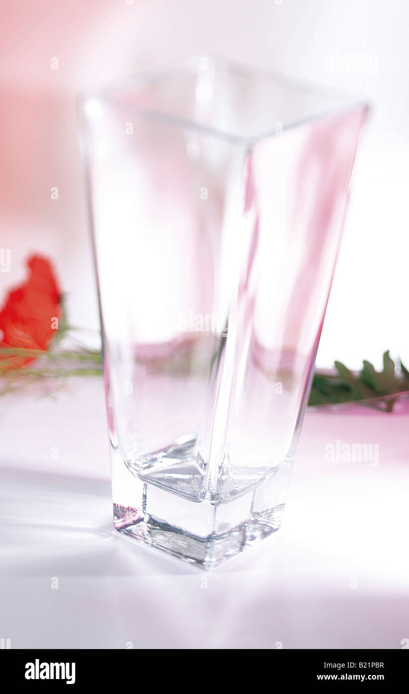 clear square vase on white and pink background Stock Photo - Alamy