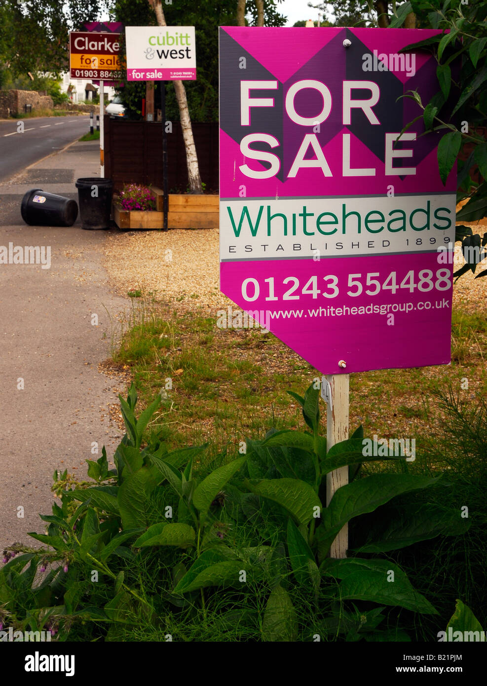 Residential For Sale boards, Chichester, Sussex, UK Stock Photo - Alamy