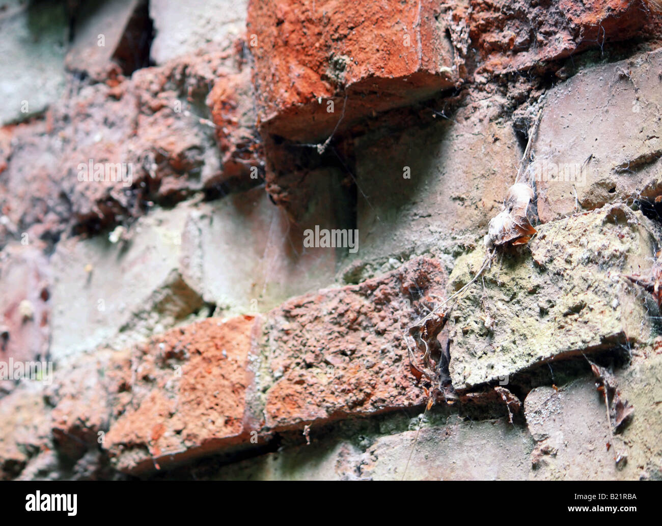 A close up of a crumbling brick wall Stock Photo - Alamy
