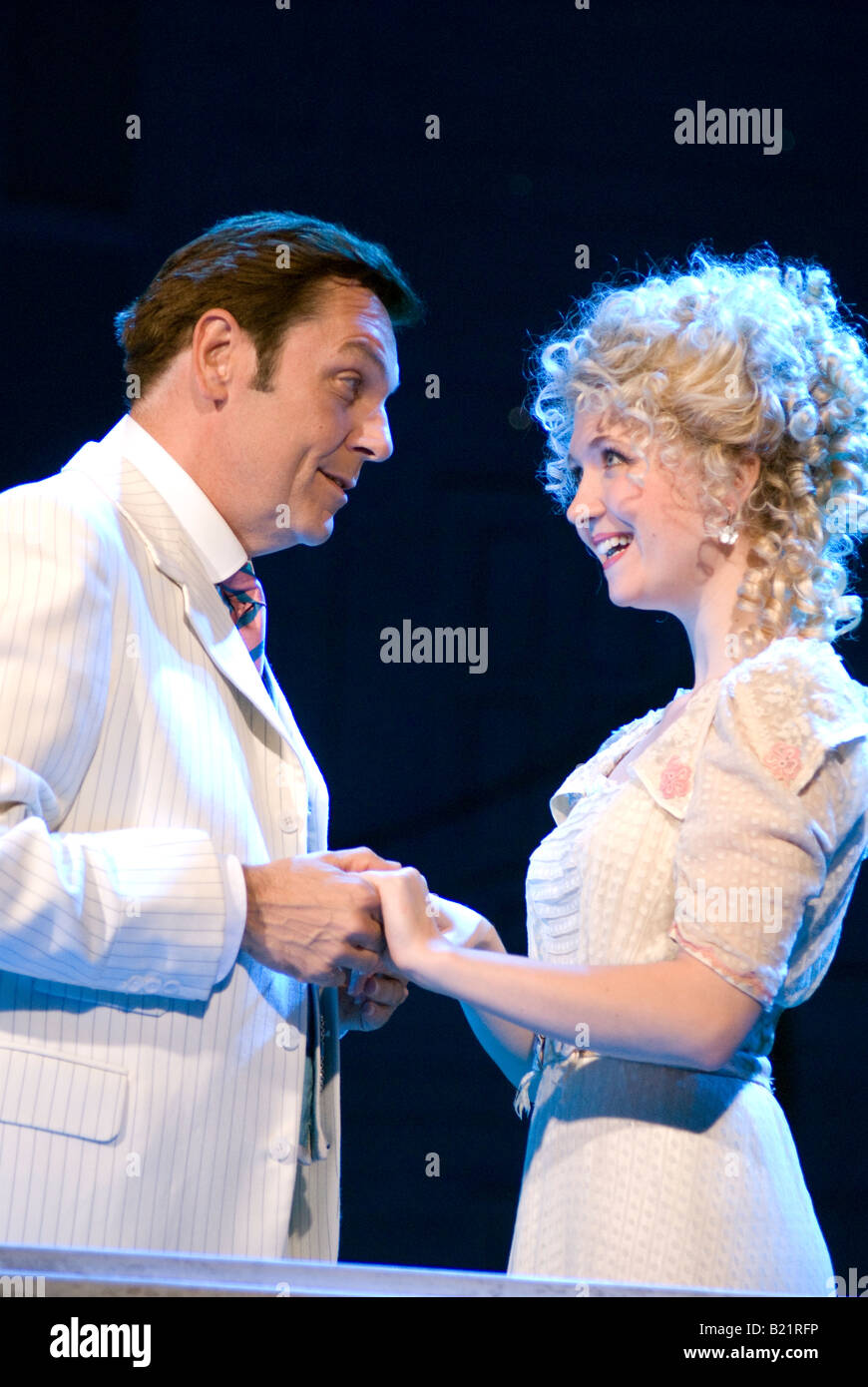 Brian Conley as Professor Harold Hill and Scarlett Strallen as Marian ...