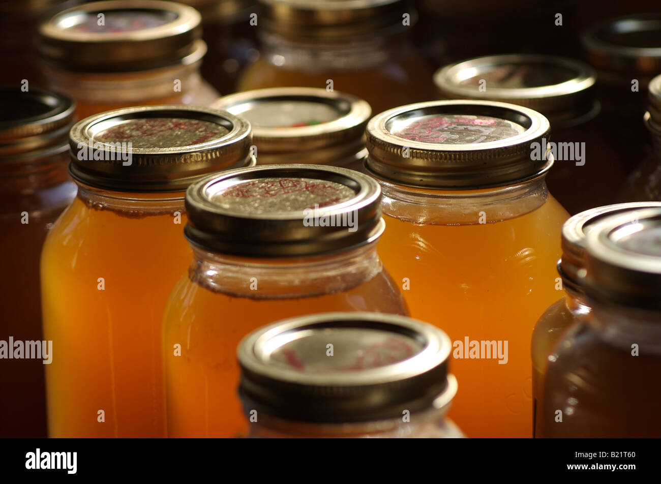 Jars of canned pear juice Stock Photo - Alamy