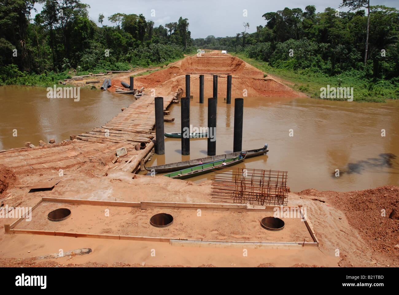 bridge building construction site on Sparouine river in french Guyana ...