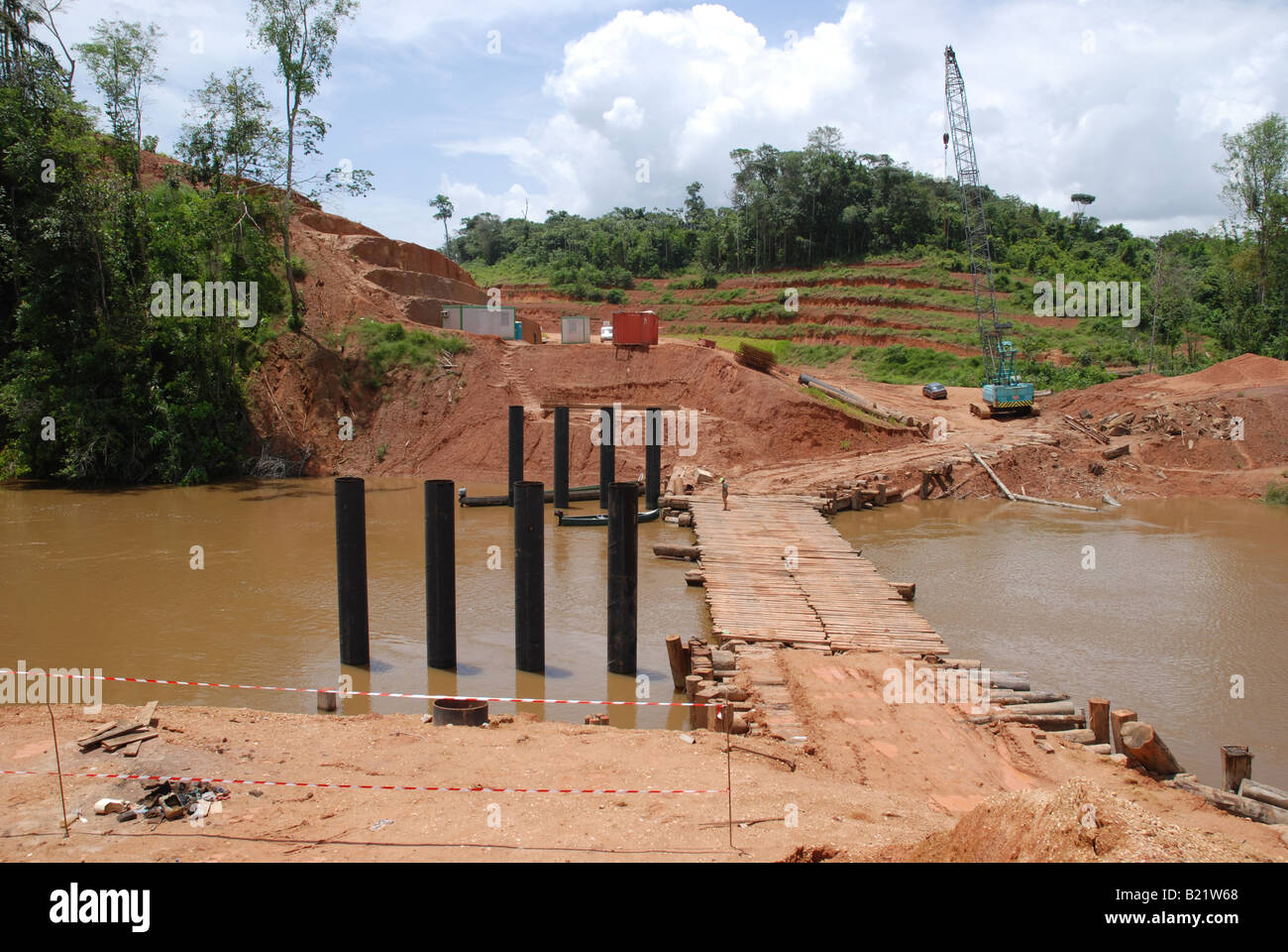 bridge building construction site on Sparouine river in french Guyana ...