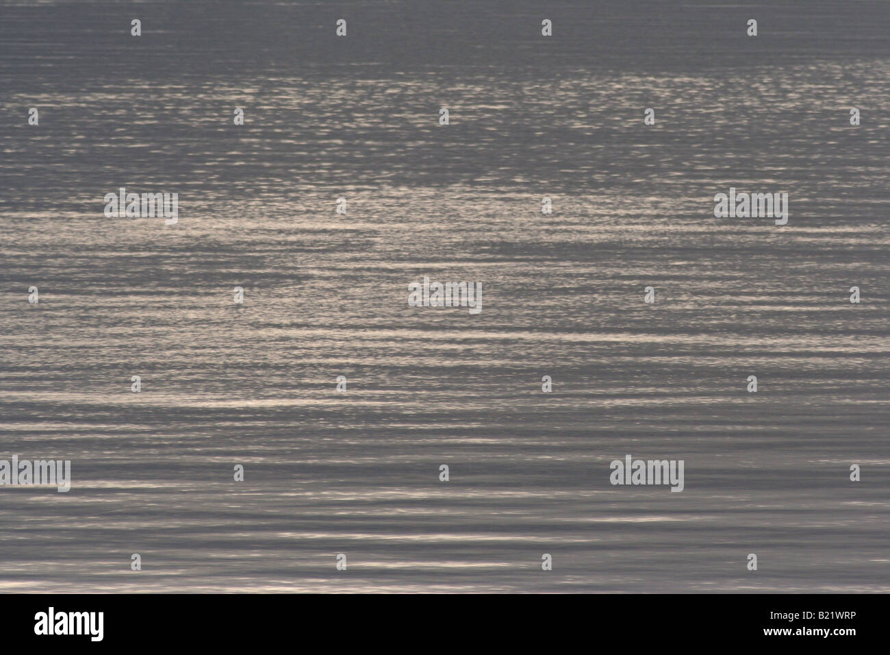 Patterns on calm water - the sea in Kintyre Stock Photo - Alamy