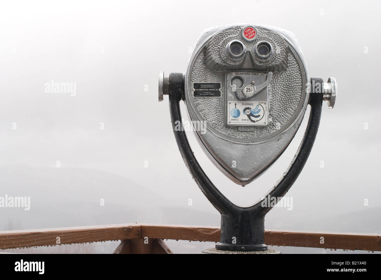 Coin operated binoculars look into the winter fog on the hairpin turn ...