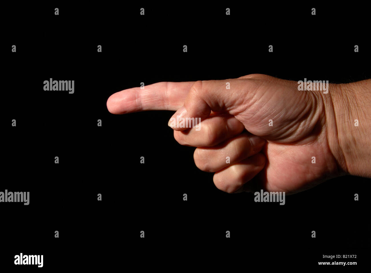 Hand with a pointing finger Stock Photo - Alamy