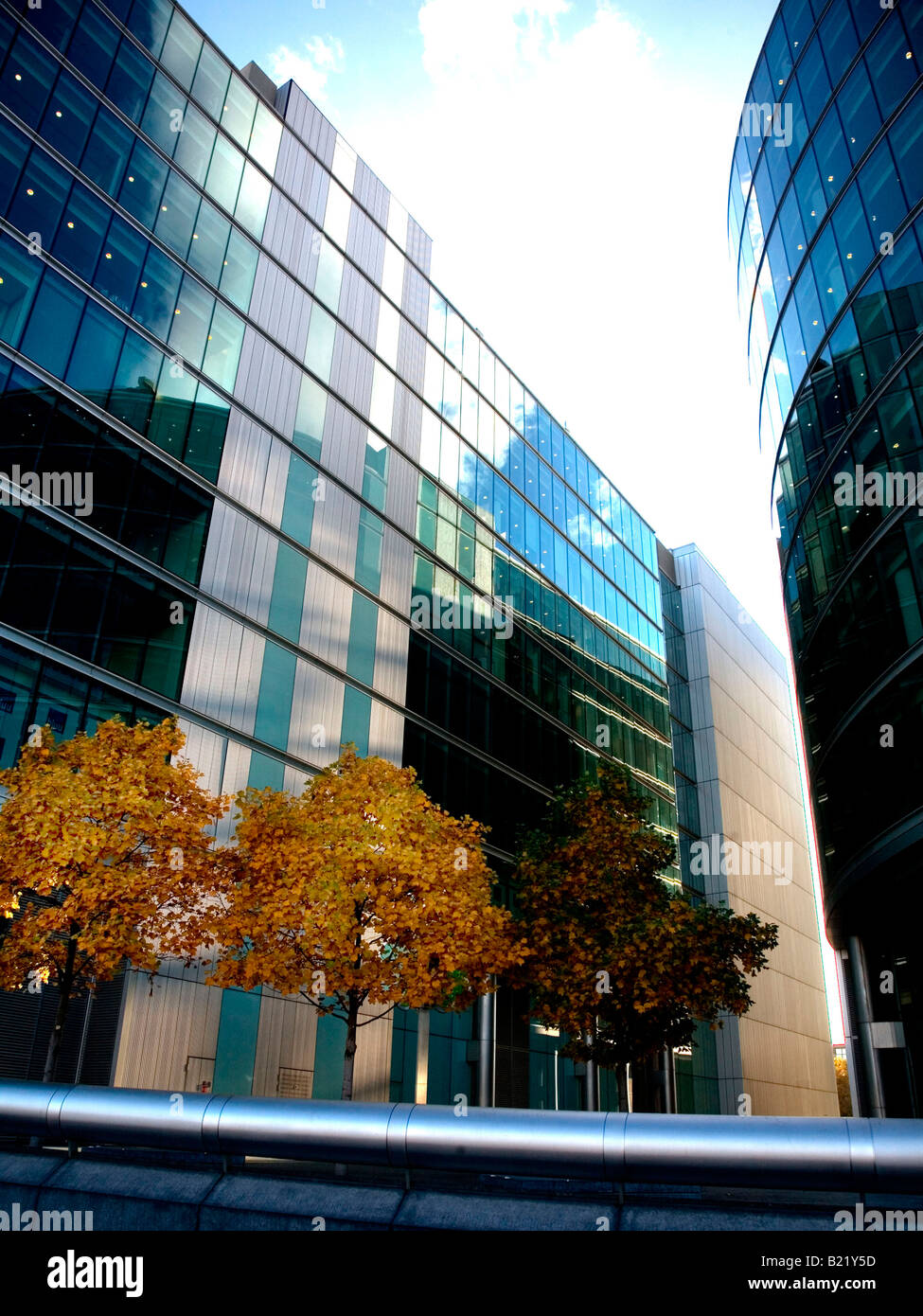 London modern office block with trees in autumn colour Stock Photo - Alamy