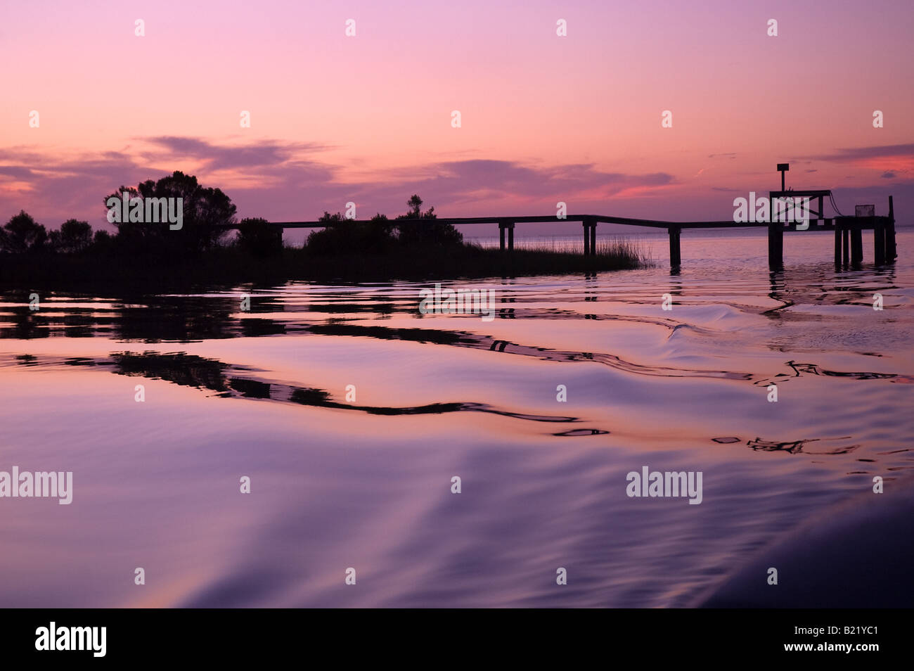 sunset colors reflected in waters off St George Island along North ...