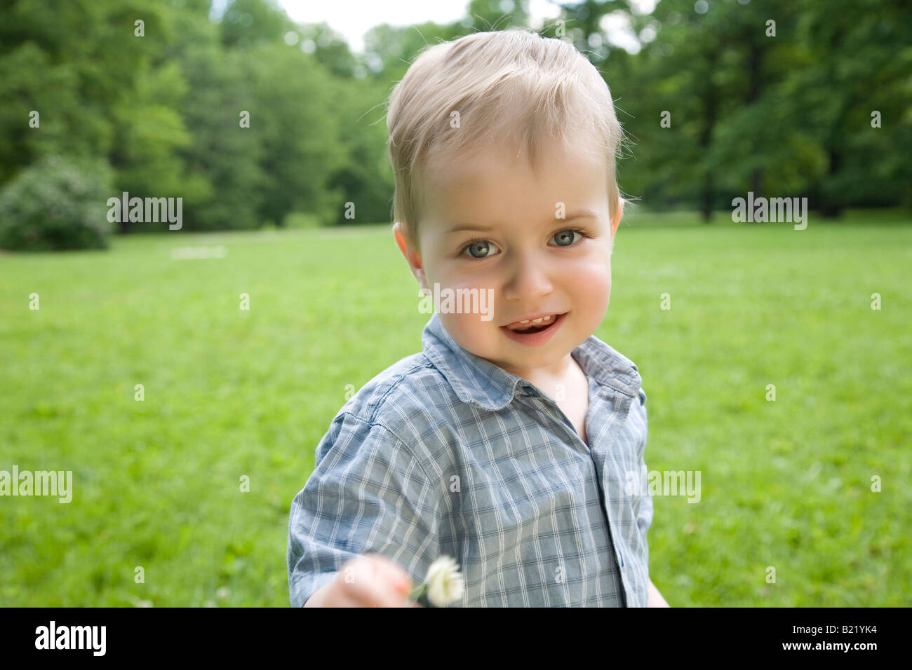 Little Kid Portrait On The Nature Background Stock Photo - Alamy