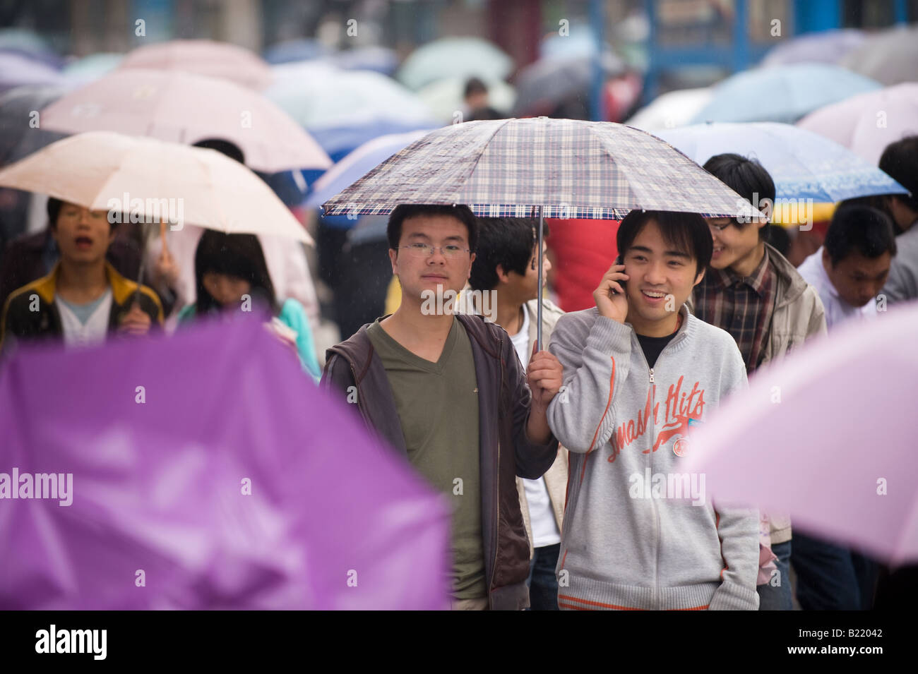 Young men in Xian Stock Photo - Alamy