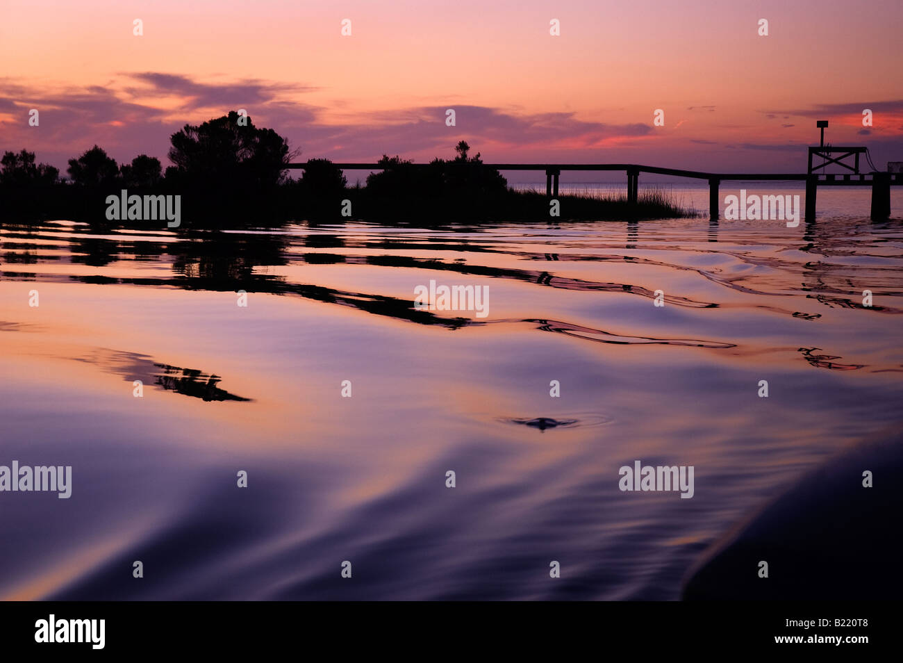 sunset colors reflected in waters off St George Island along North ...