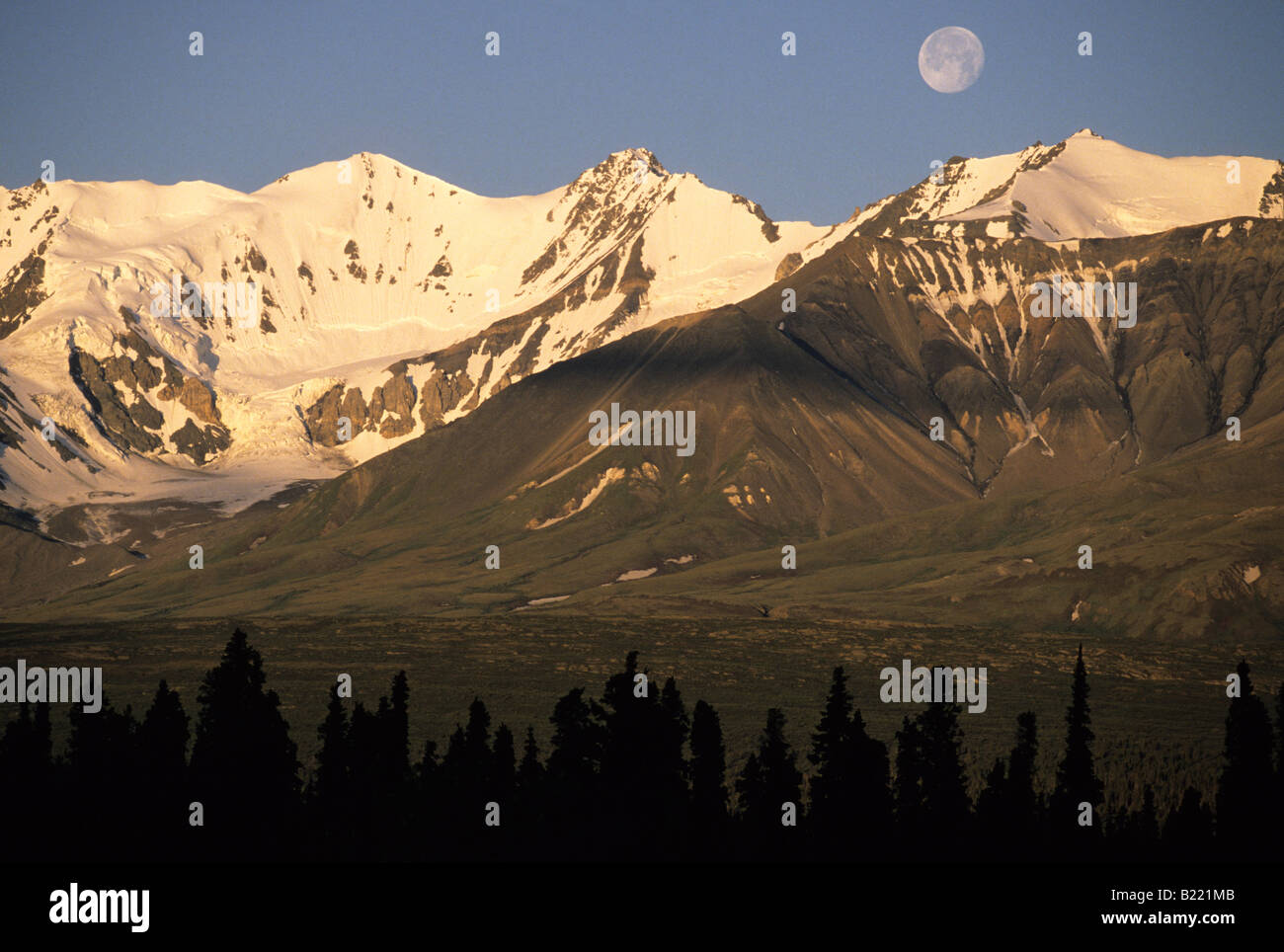 Moon setting over the Kluane Range, Kluane National Park, Yukon, Canada ...