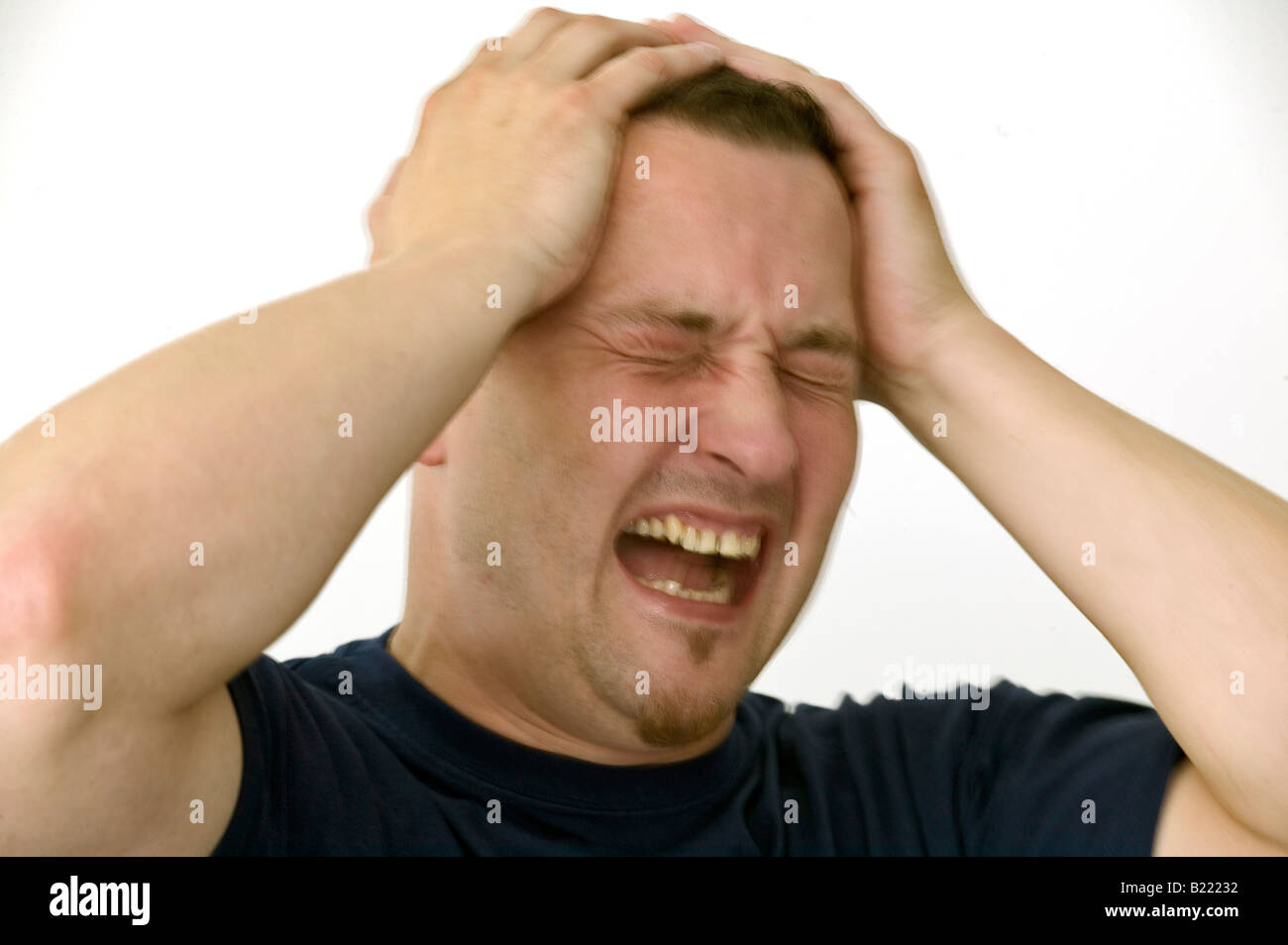 man helpless hands on head Stock Photo - Alamy