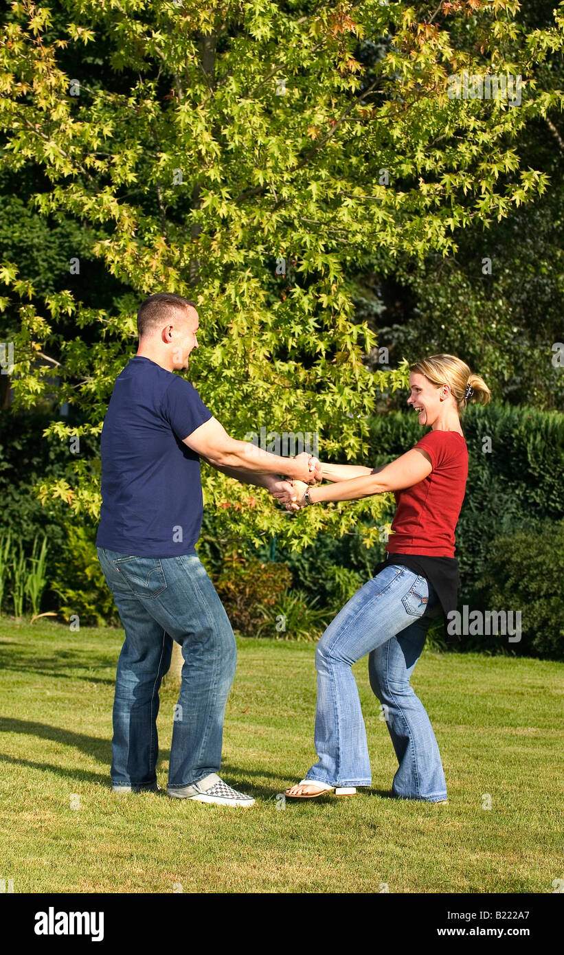 couple dancing in the garden Stock Photo - Alamy