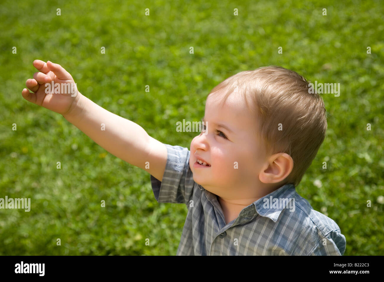 Little Kid Pointing At The Sky Stock Photo - Alamy