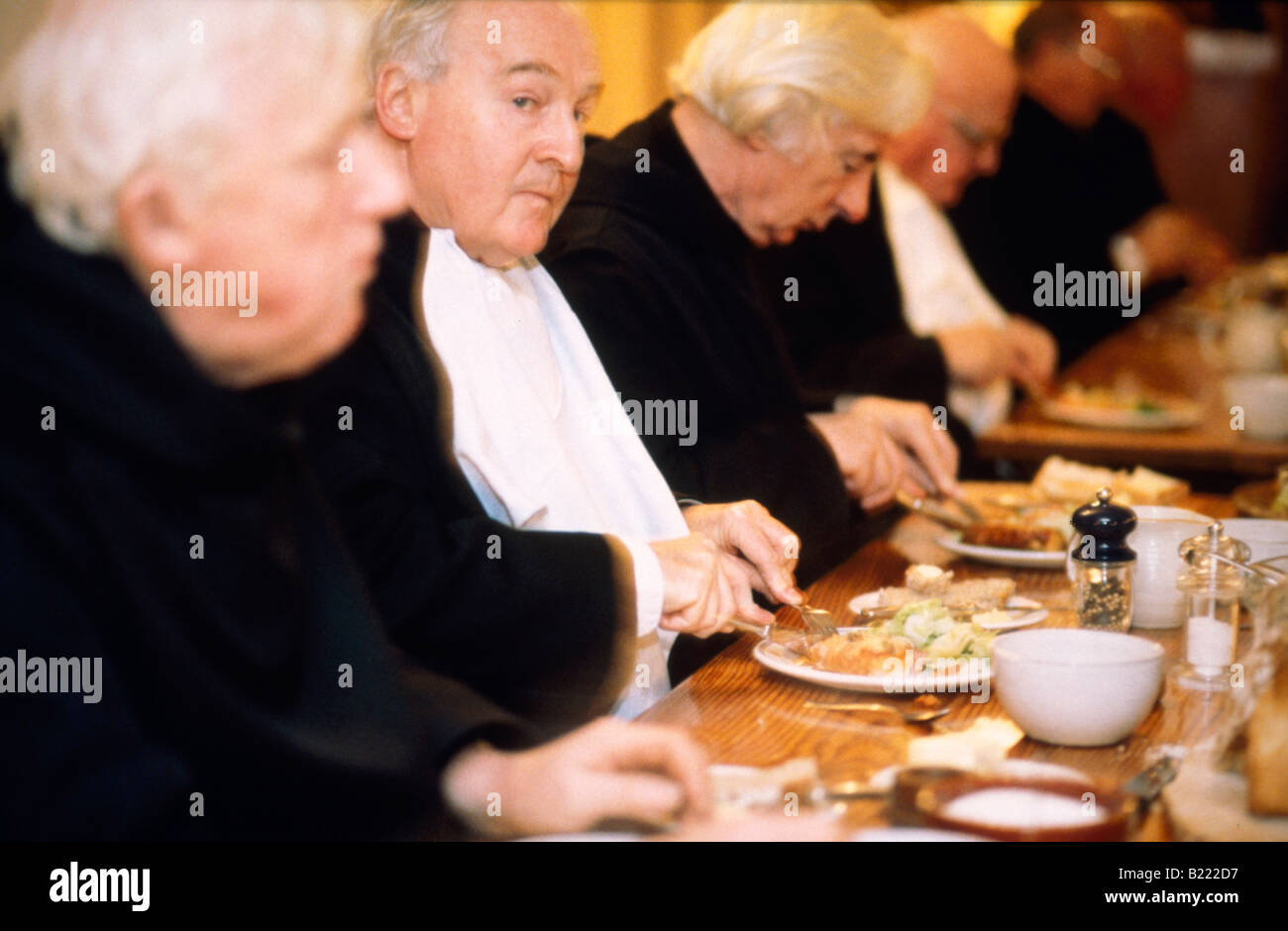 Monk eating at table hi-res stock photography and images - Alamy