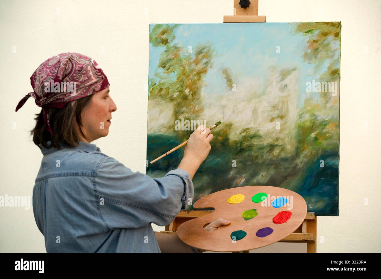 artist is painting Stock Photo - Alamy