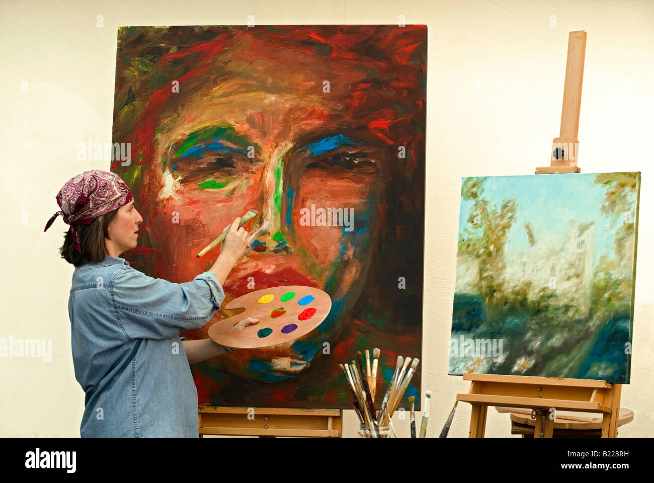 artist is painting Stock Photo - Alamy