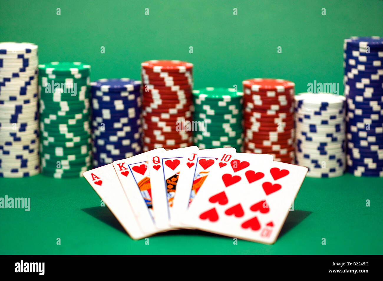 Poker game chips table cards Stock Photo - Alamy