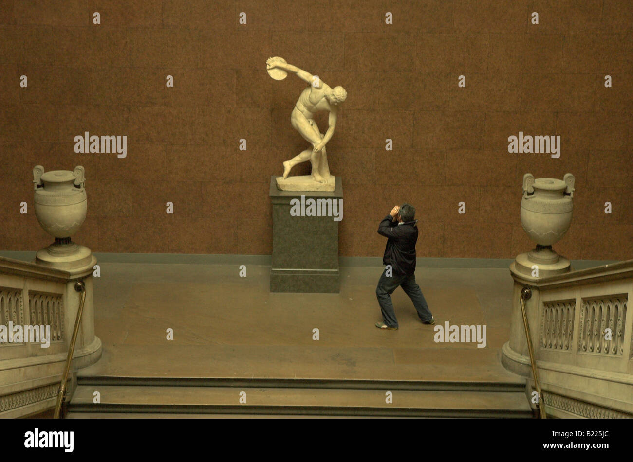 Man photographing a statue inside the British Museum Stock Photo - Alamy