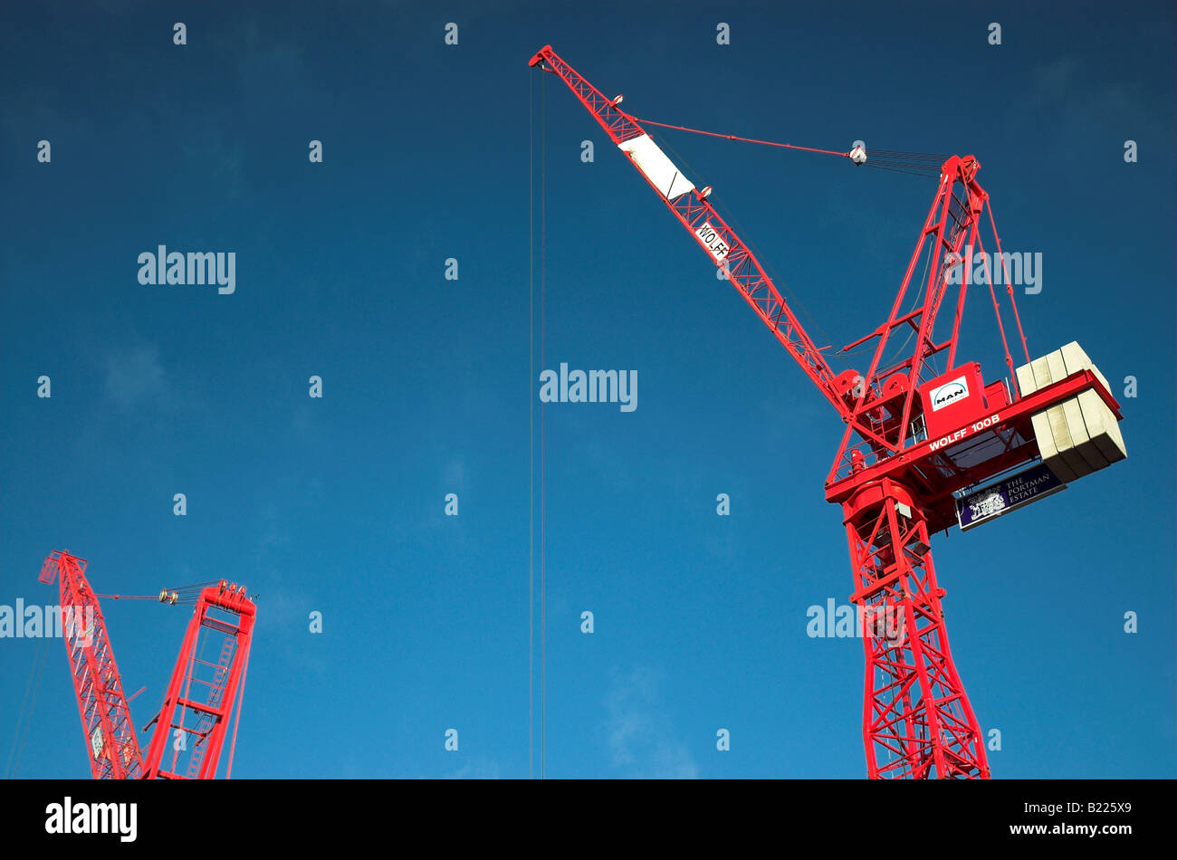 Red cranes in the City of London Stock Photo - Alamy