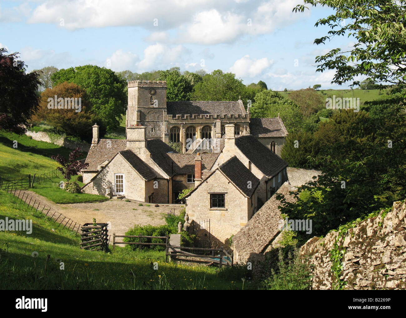 Cotswold church and buildings, Chedworth Stock Photo - Alamy