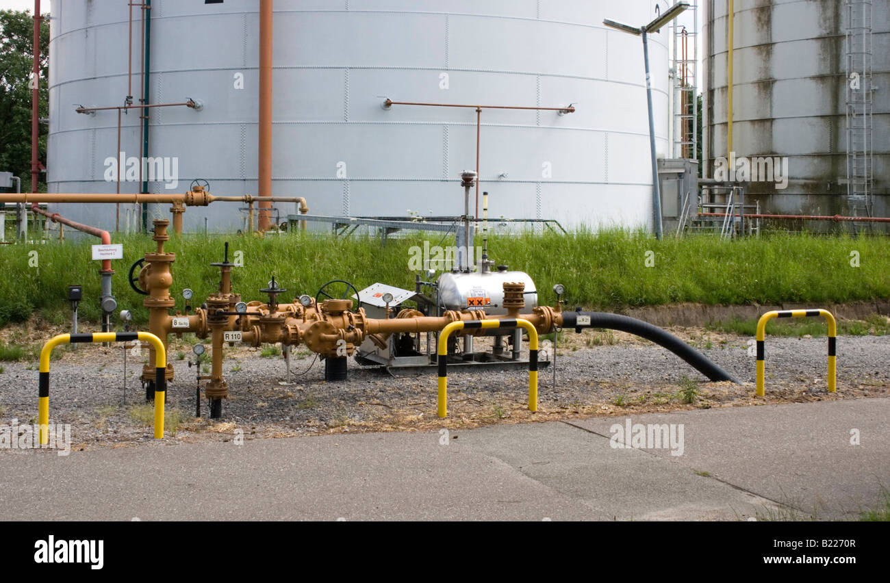 Gas Pipeline Installation and Oil Tank Stock Photo - Alamy