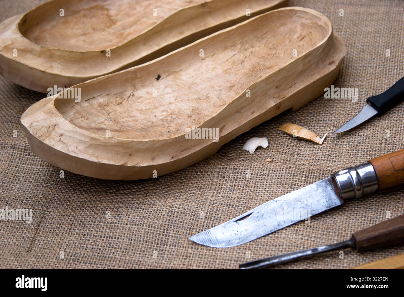 Wood soles ready to be added to the leather vamp and some instruments ...