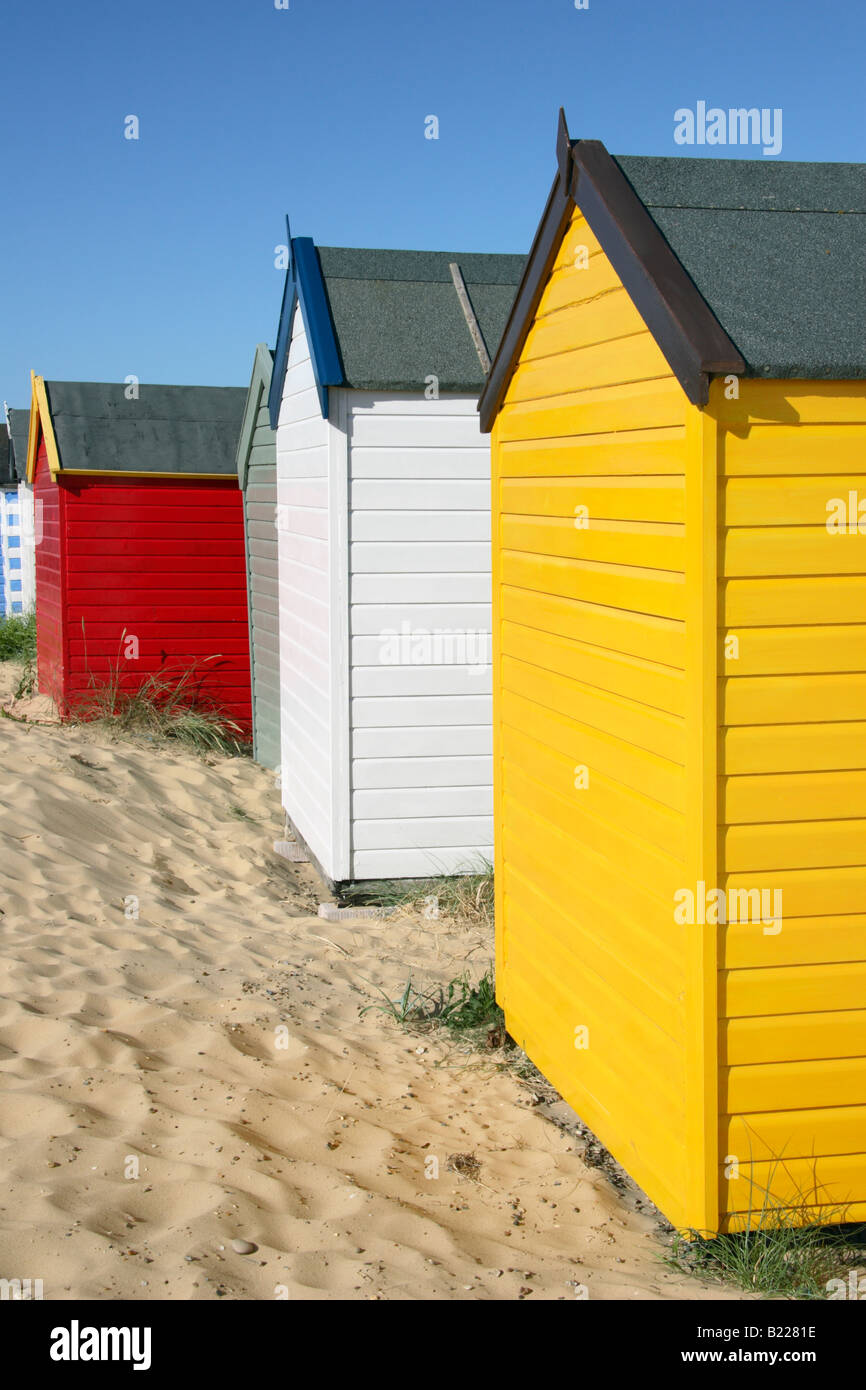 Brightly painted beach huts southwold hi-res stock photography and ...