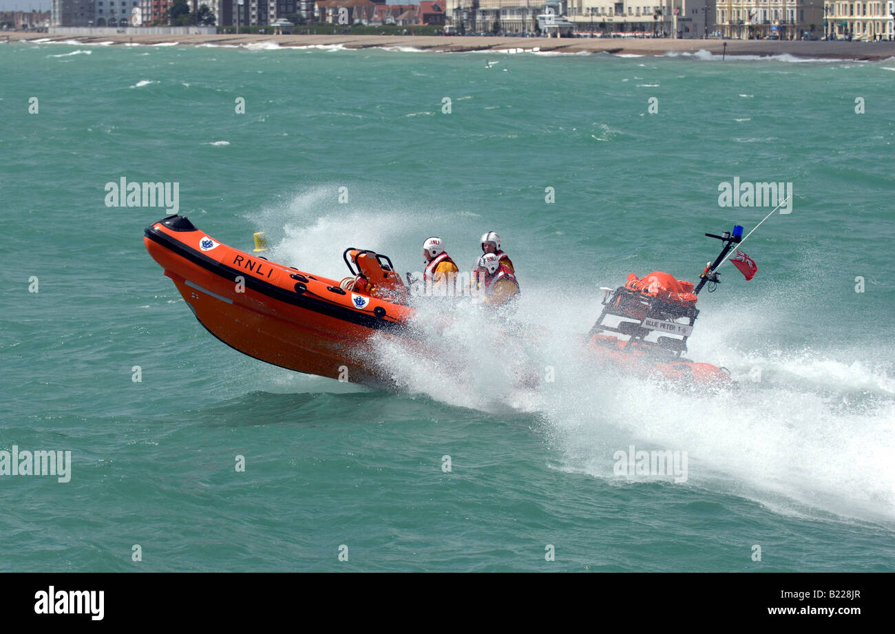 The RNLI inshore lifeboat named Blue Peter 1 in action off Worthing ...
